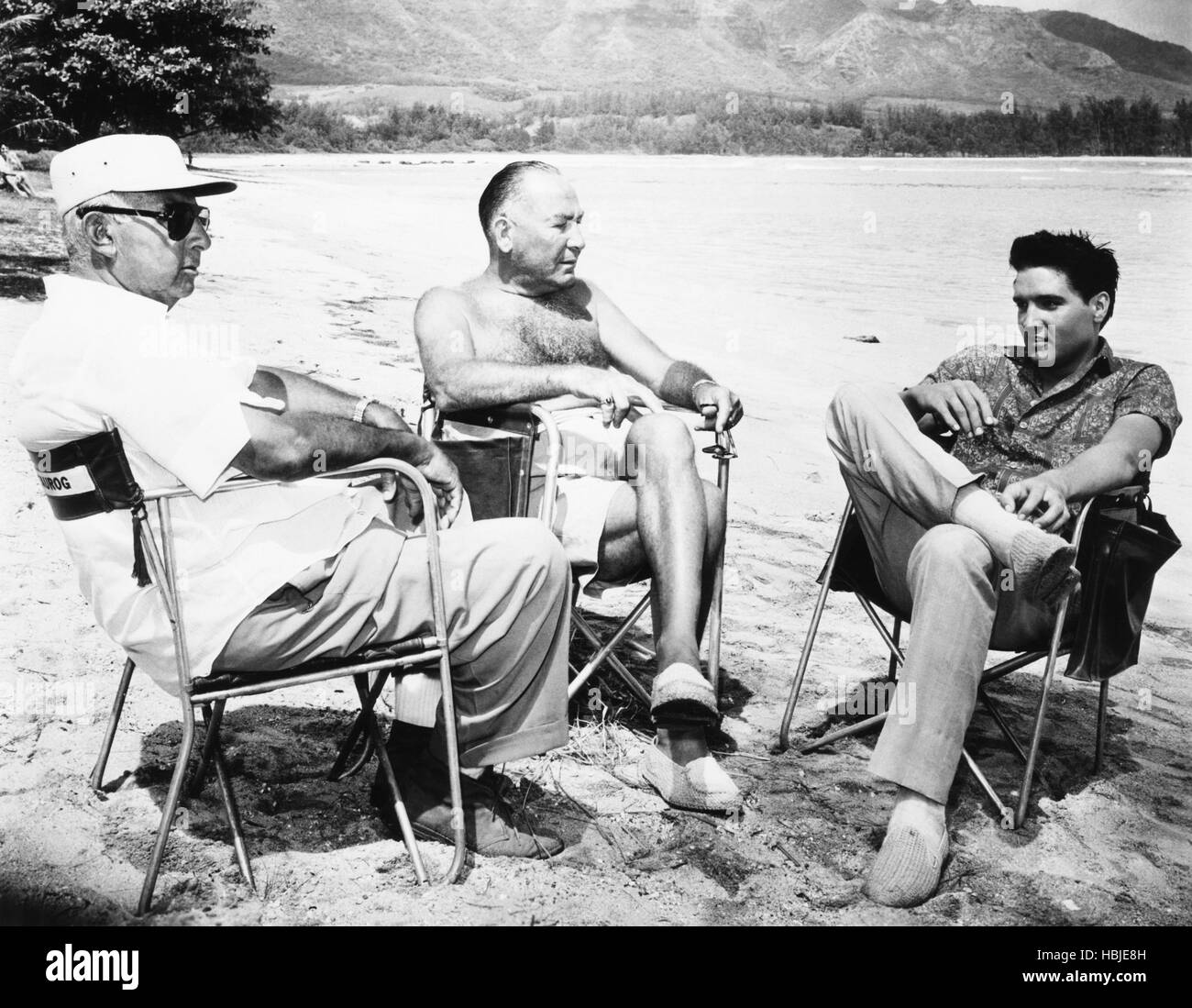 BLUE HAWAII, from left, director Norman Taurog, producer Hal Wallis ...