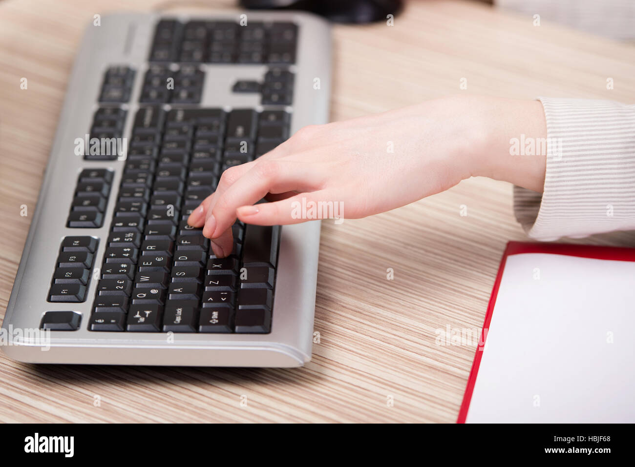 Hands working on the keyboard in the office Stock Photo - Alamy