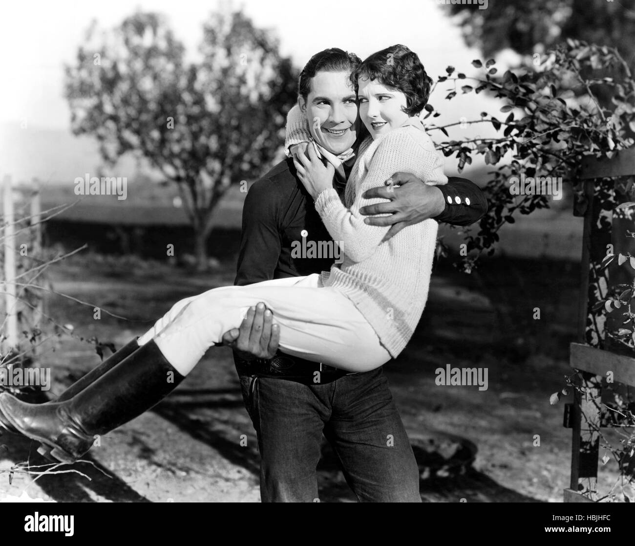 BORN TO BATTLE, Tom Tyler, holding Jean Arthur, 1926 Stock Photo - Alamy