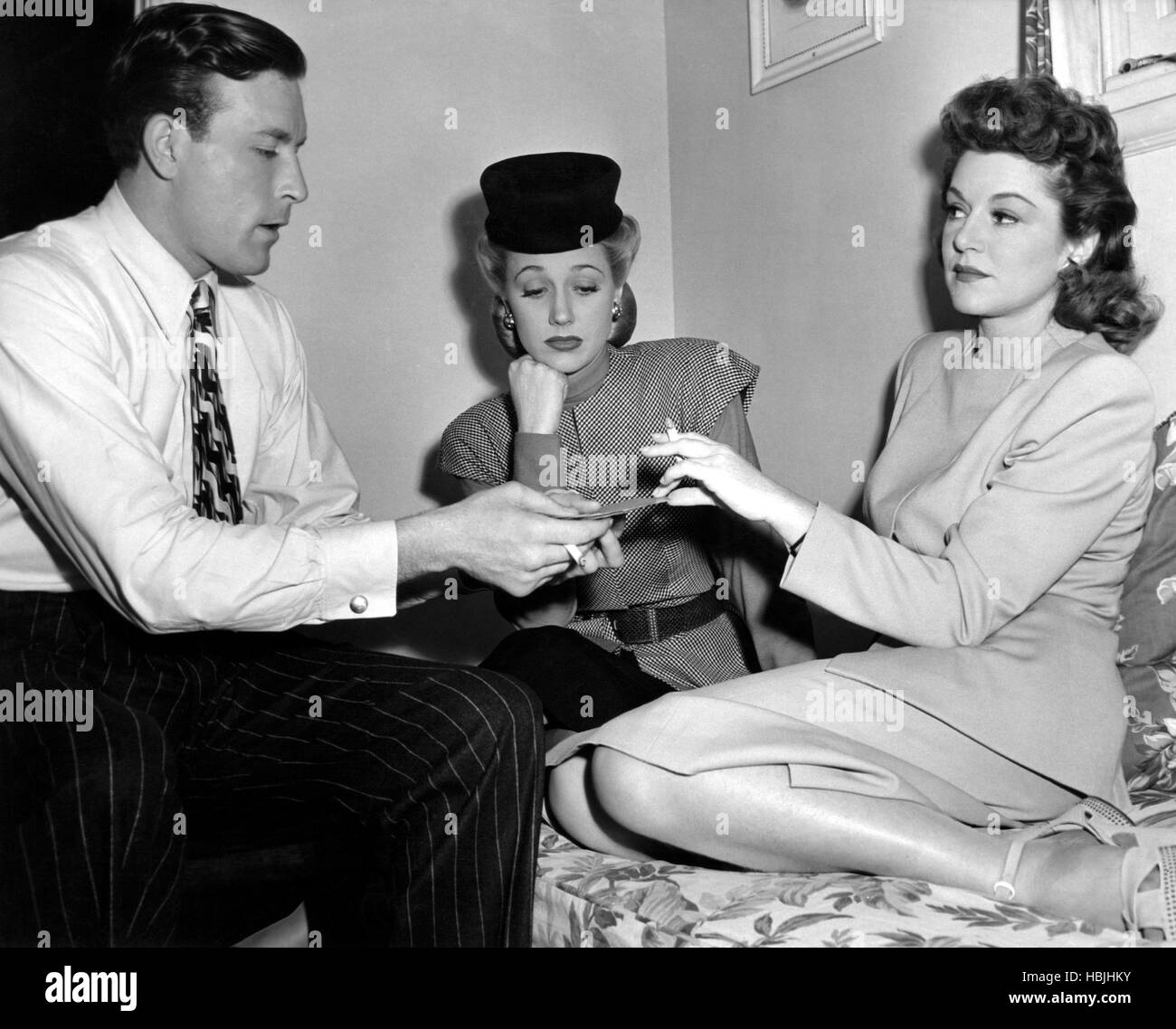 BORN TO KILL, from left: Lawrence Tierney entertaining co-stars Audrey ...