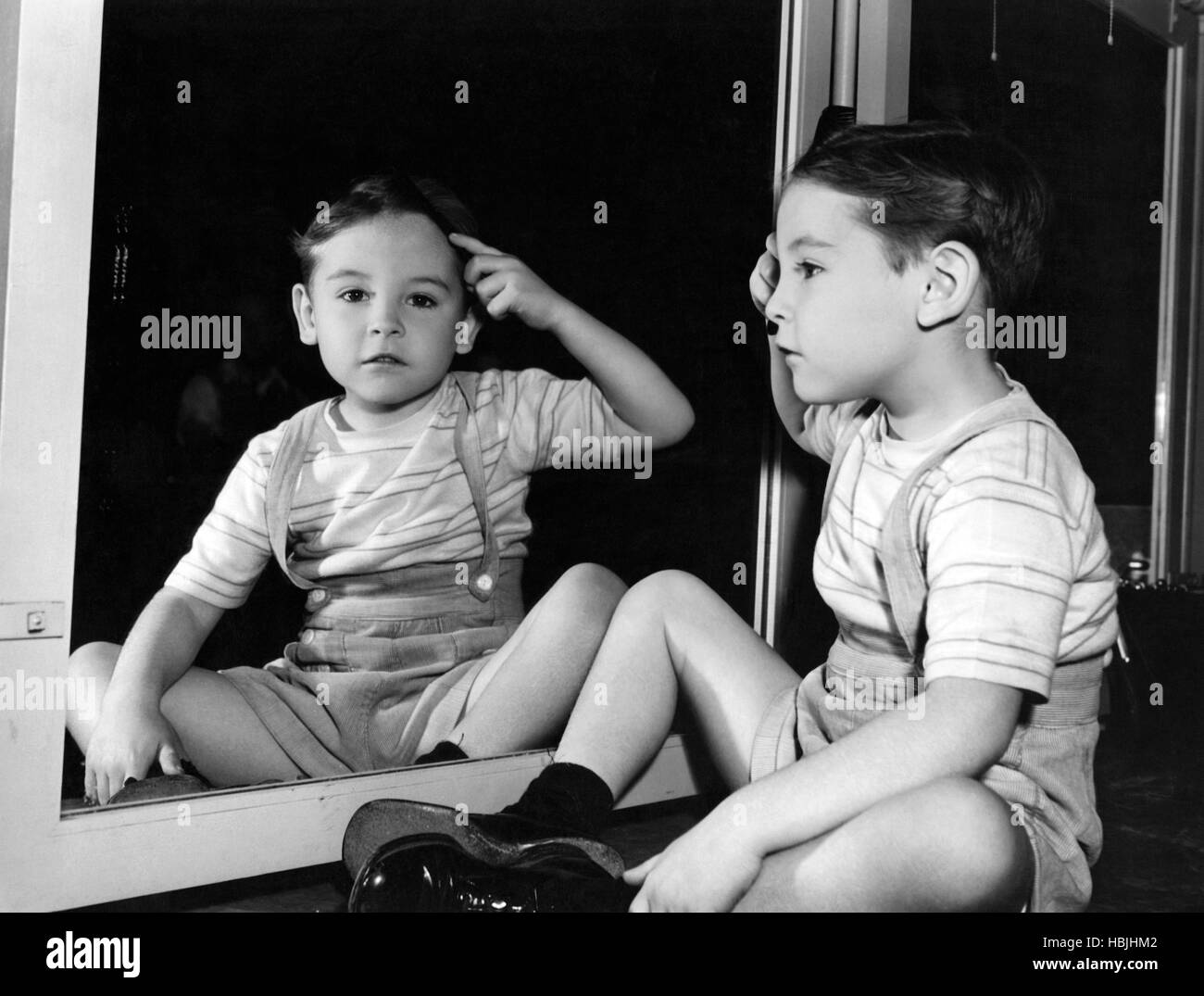 BORN TO SING, Dickie Hall checking himself in mirror before scene, on ...