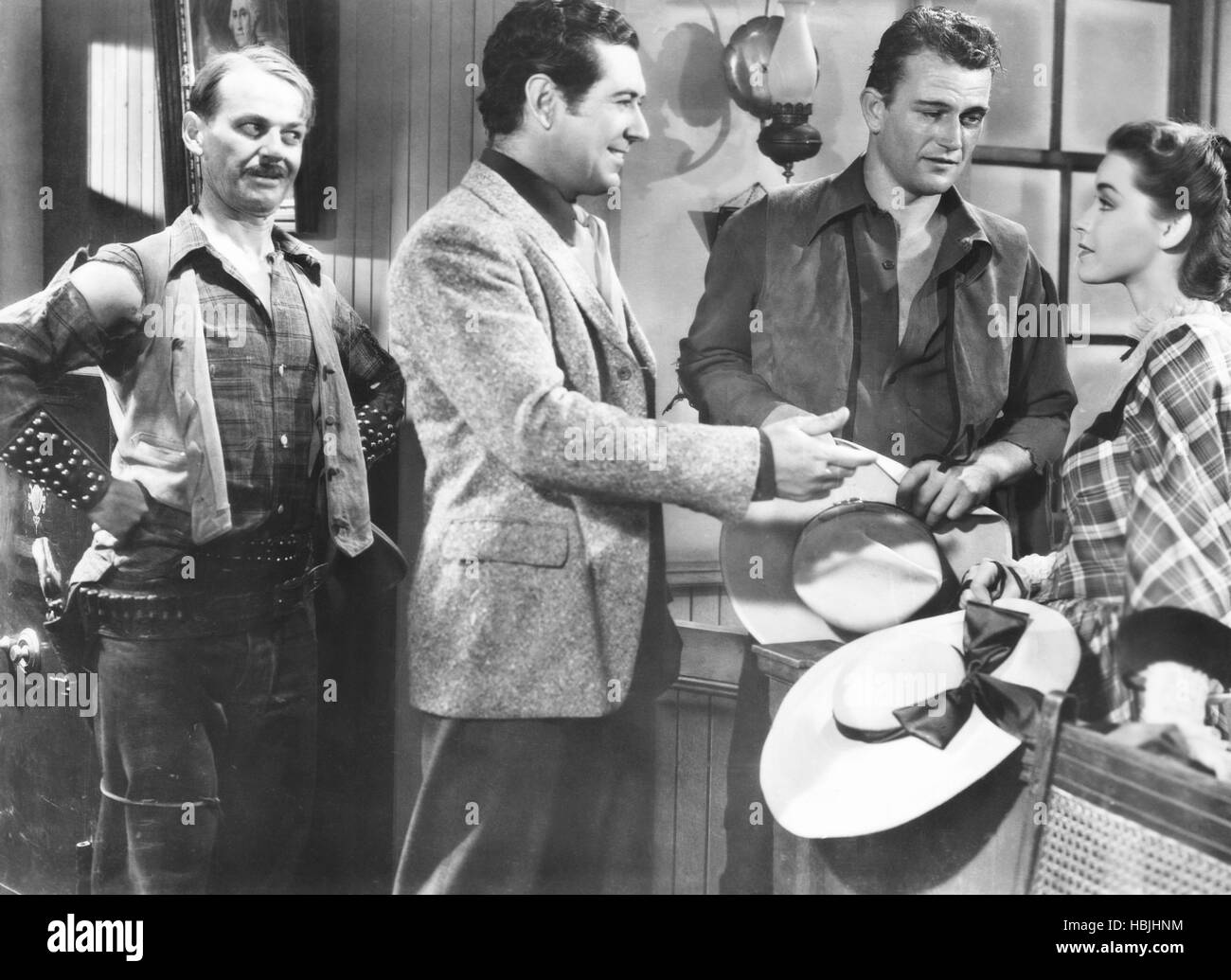 BORN TO THE WEST, from left: Syd Saylor, Johnny Mack Brown, John Wayne ...