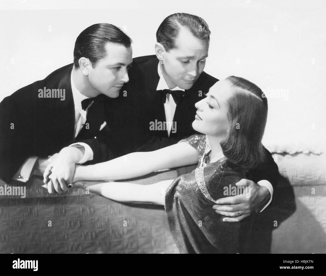 THE BRIDE WORE RED, from left: Robert Young, Franchot Tone, Joan ...