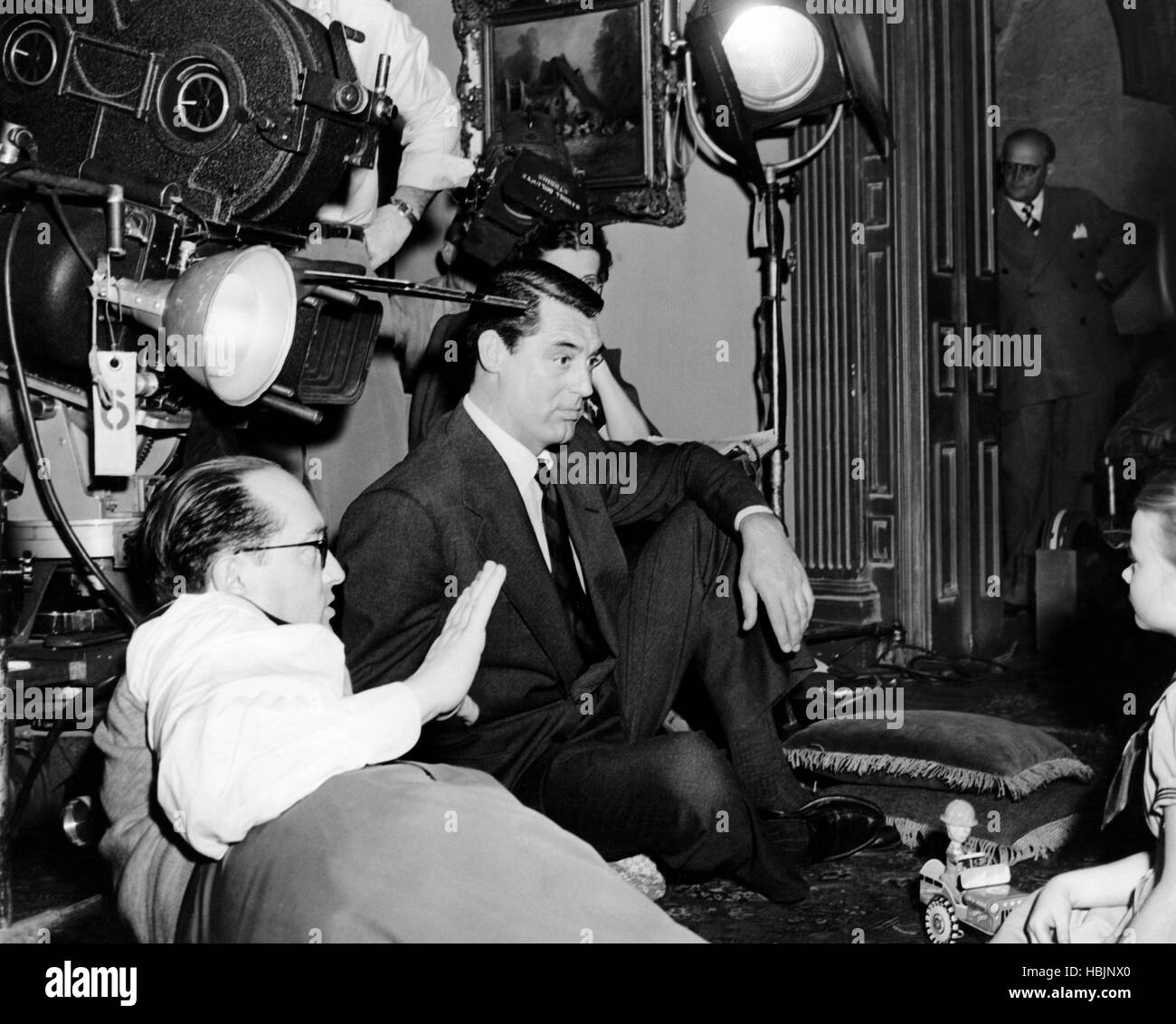 THE BISHOP'S WIFE, director Henry Koster (back to camera), Cary Grant ...
