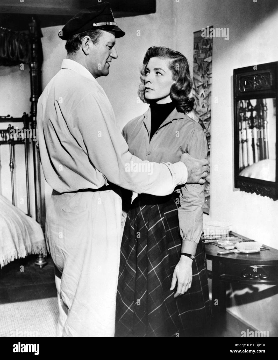 BLOOD ALLEY, John Wayne, Lauren Bacall, 1955 Stock Photo - Alamy