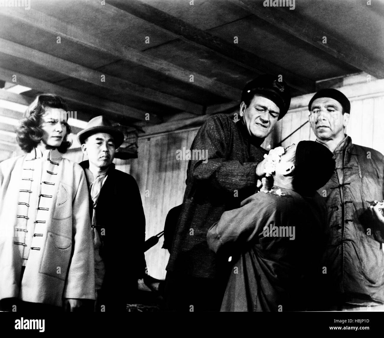 BLOOD ALLEY, standing from left: Lauren Bacall, Henry Nakamura, John ...