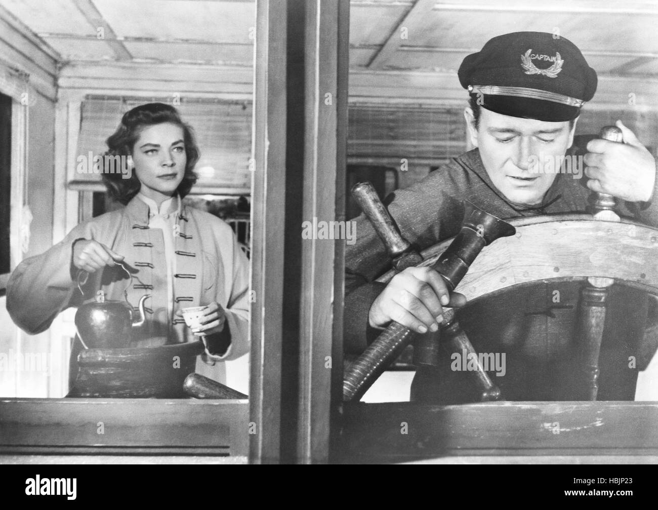 BLOOD ALLEY, from left, Lauren Bacall, John Wayne, 1955 Stock Photo - Alamy
