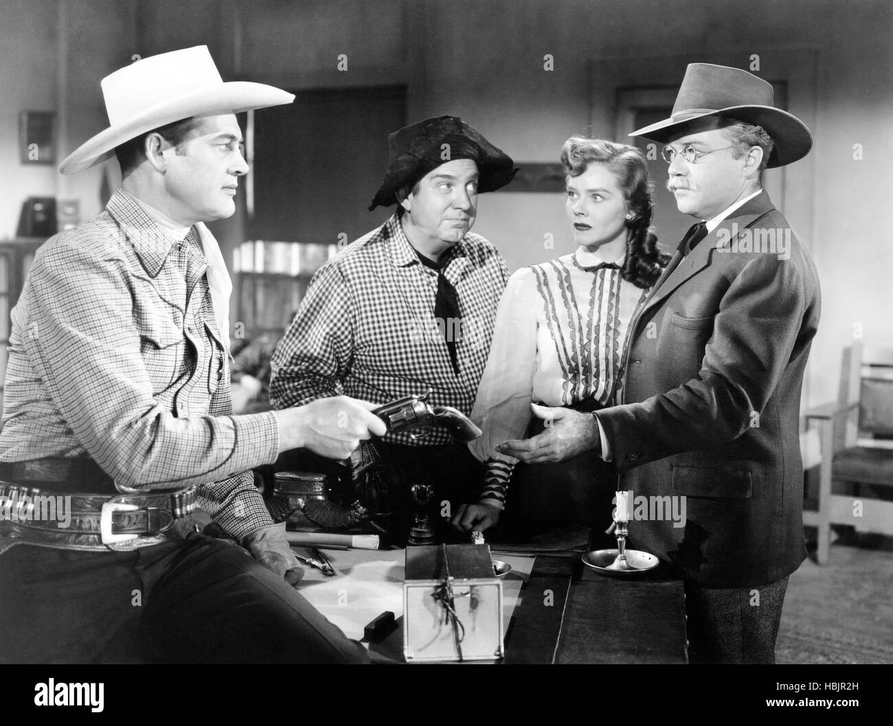 THE BLAZING TRAIL, from left: Charles Starrett, Smiley Burnette ...