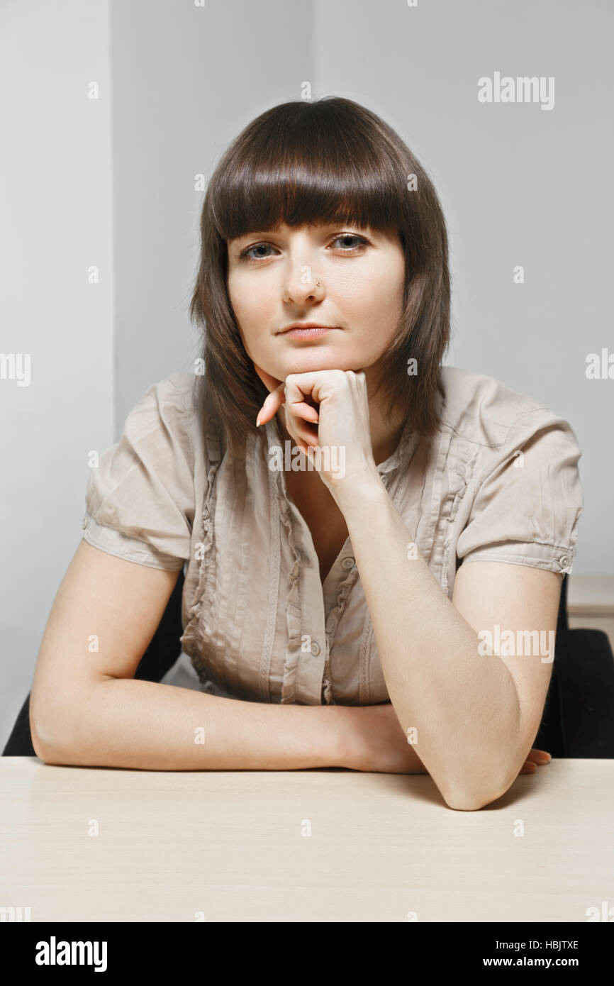 Confident office worker at desk Stock Photo - Alamy