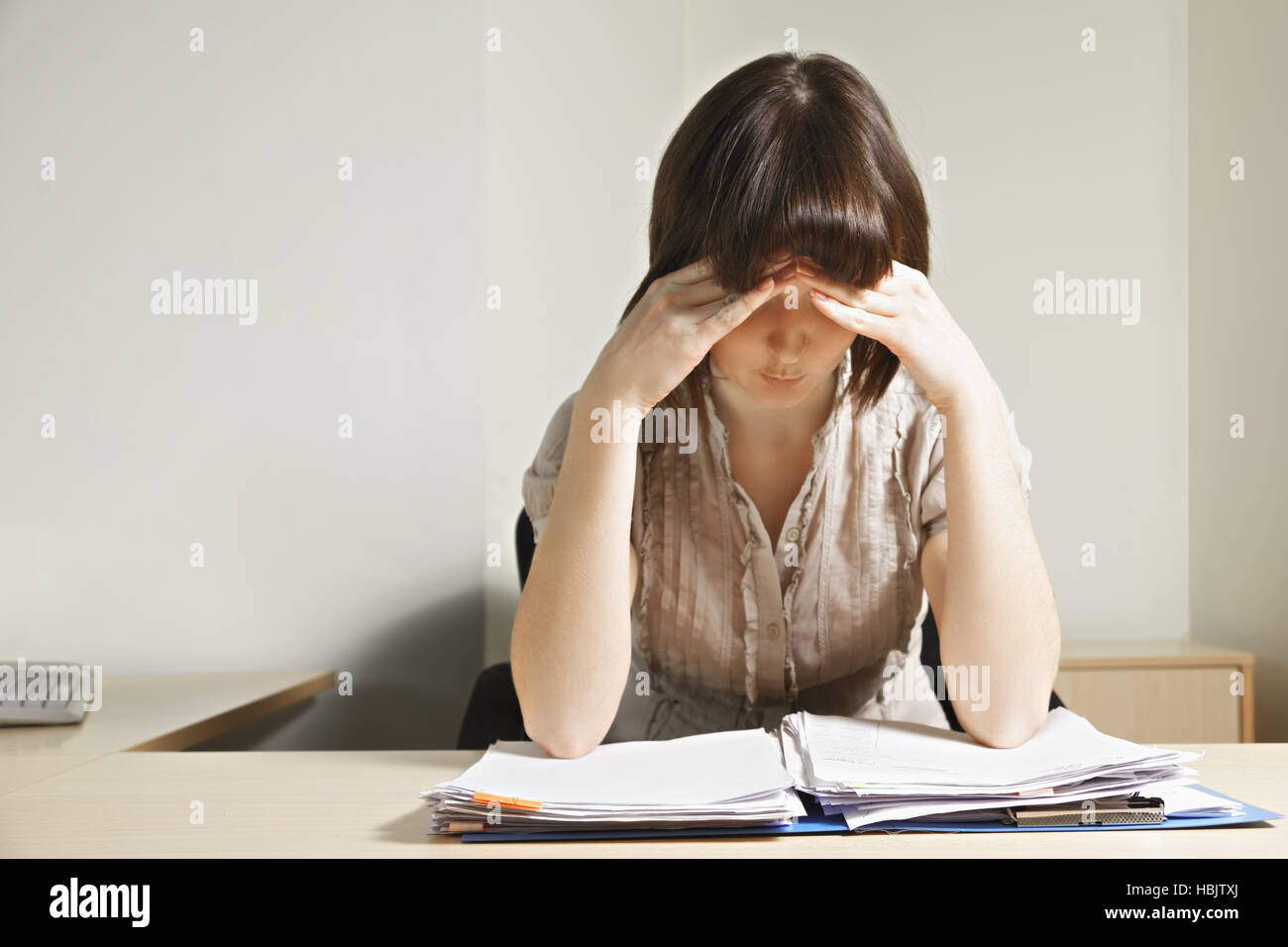 Office worker doing paperwork Stock Photo - Alamy
