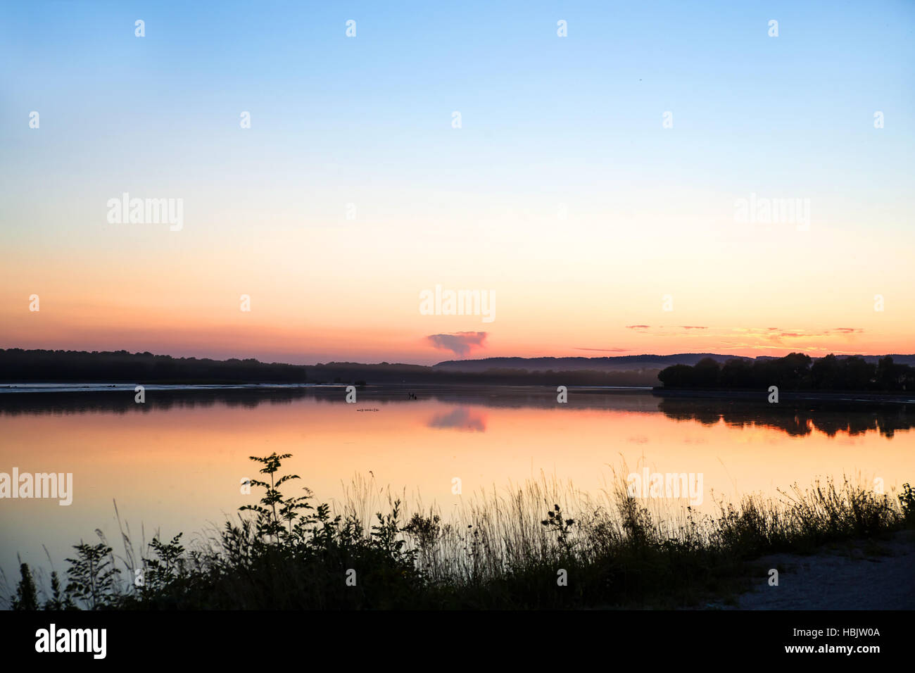 Sunset over the Lake Stock Photo - Alamy