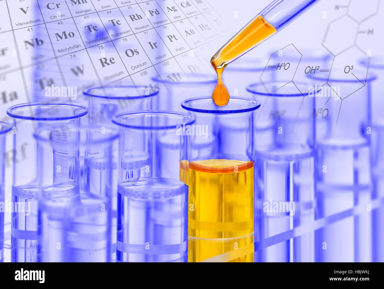 experiment with fluid and test tubes Stock Photo - Alamy