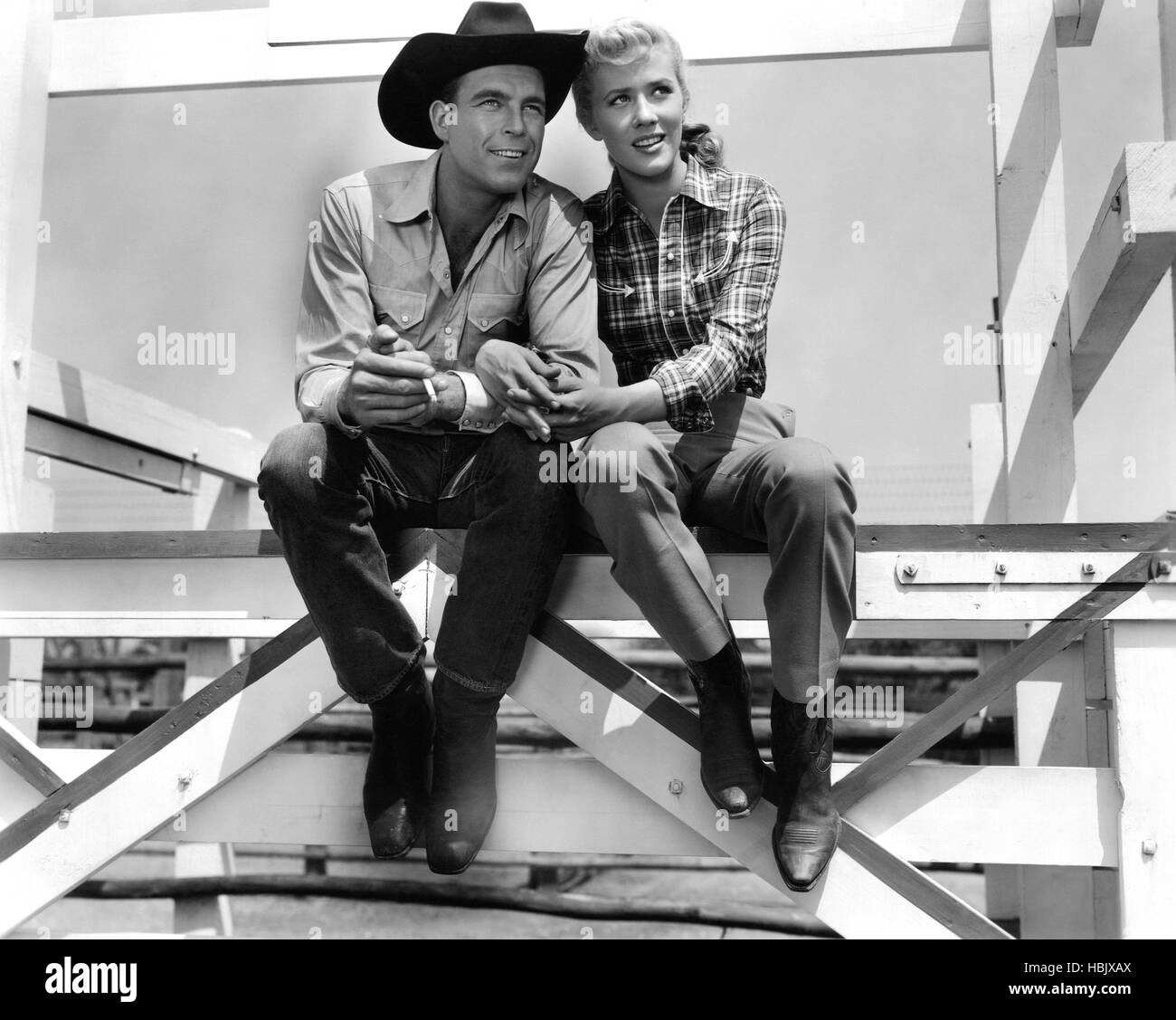 BRONCO BUSTER, from left, Scott Brady, Joyce Holden, 1952 Stock Photo ...