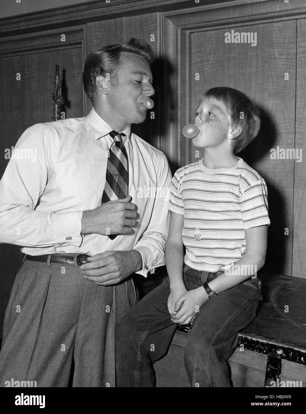 THE BRIDE GOES WILD, Van Johnson, Jackie 'Butch' Jenkins blowing ...