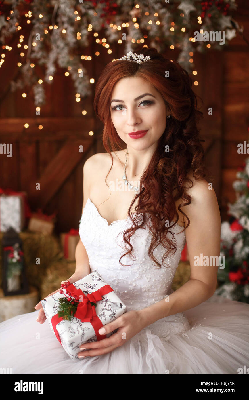 Christmas wedding. Happy bride with gft. Marriage concept Stock Photo ...