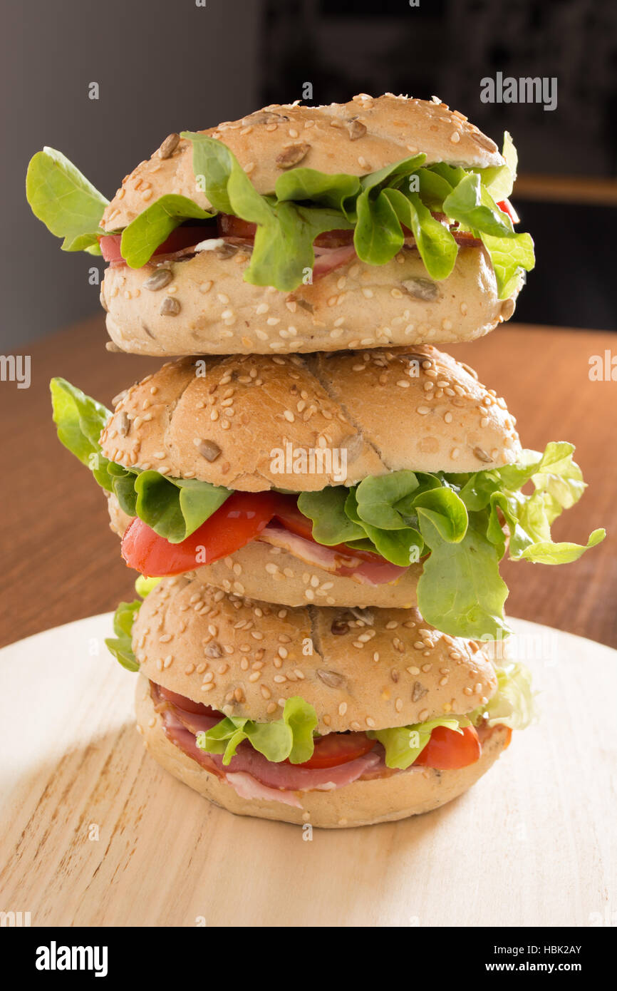 Stacked sandwiches with fresh smoked meat Stock Photo - Alamy