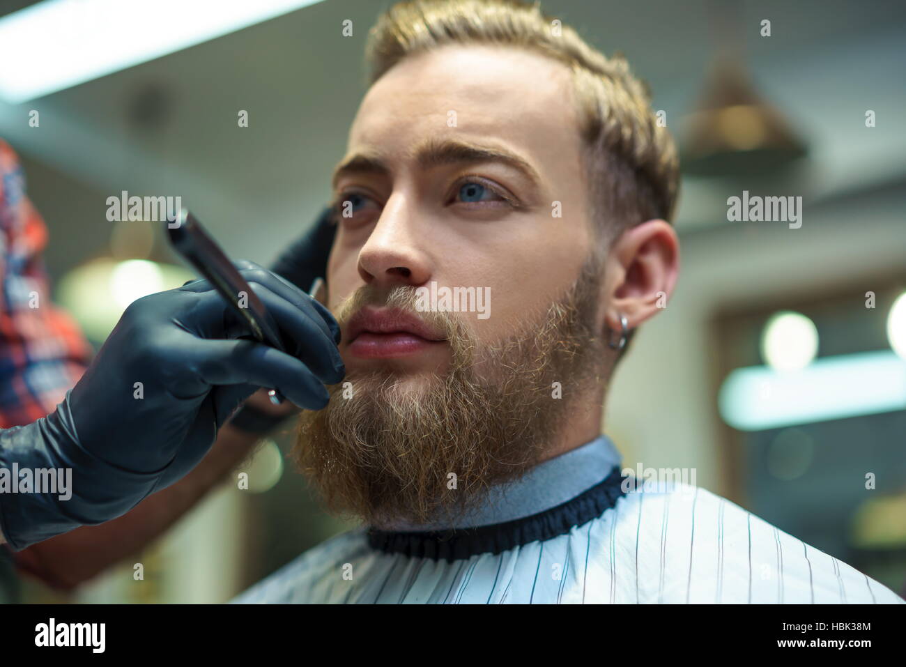 Hipster in barber shop Stock Photo - Alamy