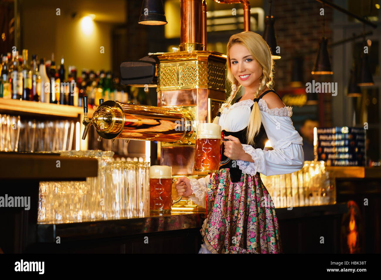 Young woman in a pub Stock Photo - Alamy