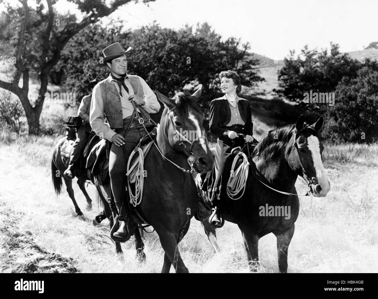 CATTLE TOWN, from left, Dennis Morgan, Amanda Blake, 1952 Stock Photo ...