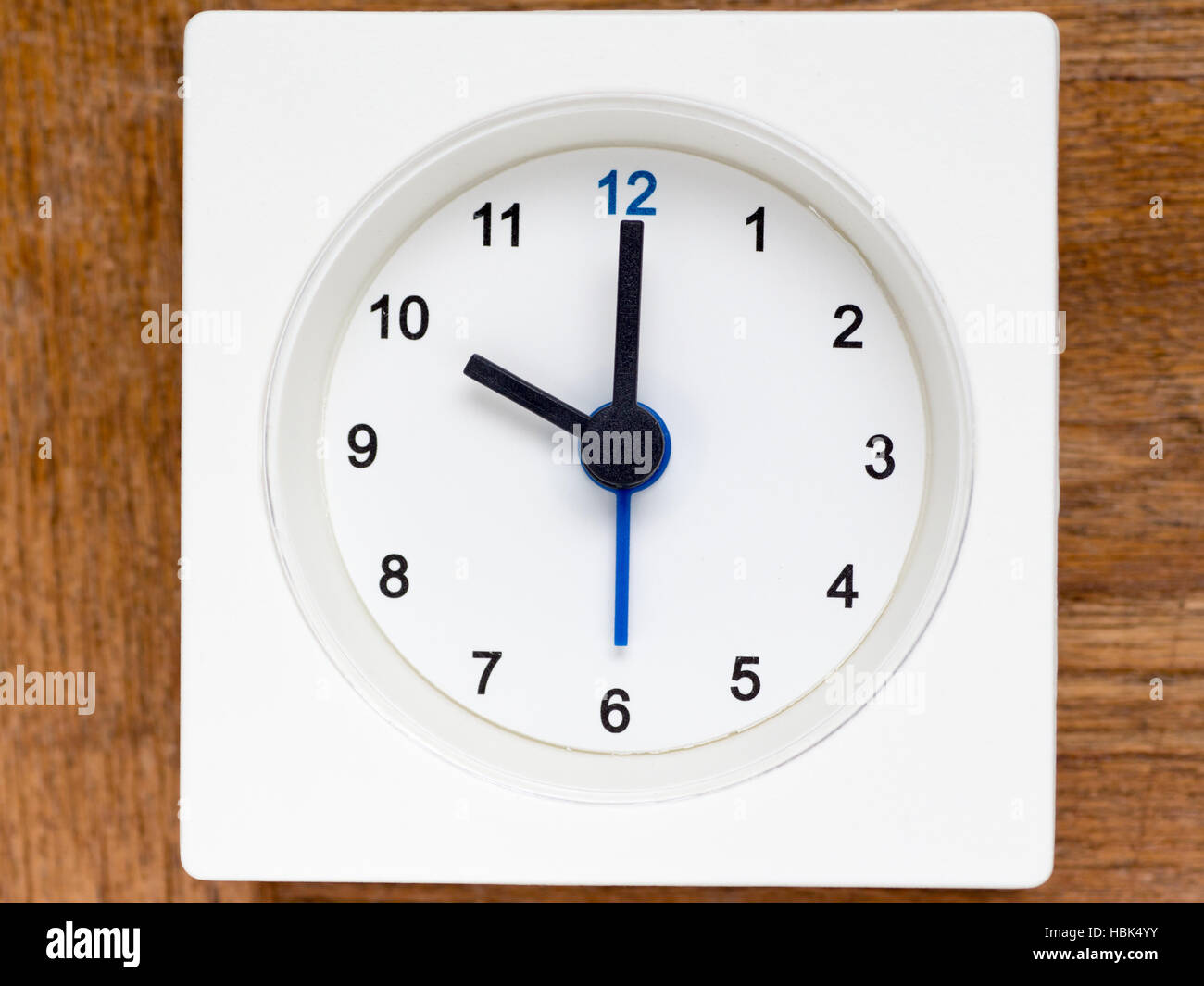 The series of the sequence of time on the simple white analog clock ...