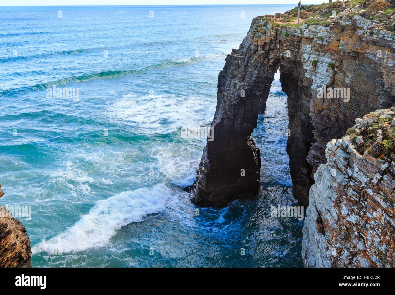 Natural arches on beach Stock Photo - Alamy