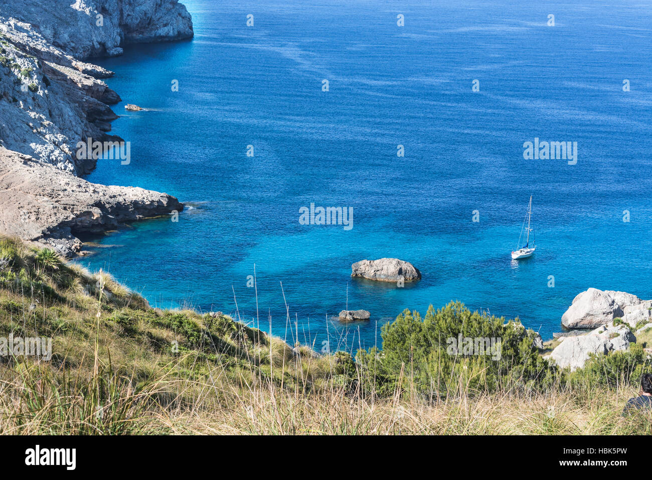 Sailboat in a beautiful bay Stock Photo - Alamy