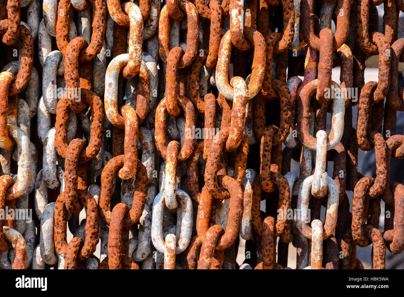 Rusty chain background Stock Photo - Alamy
