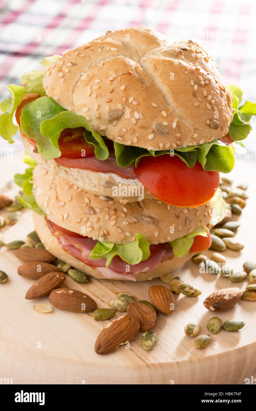 Stacked sandwiches with fresh smoked meat Stock Photo - Alamy