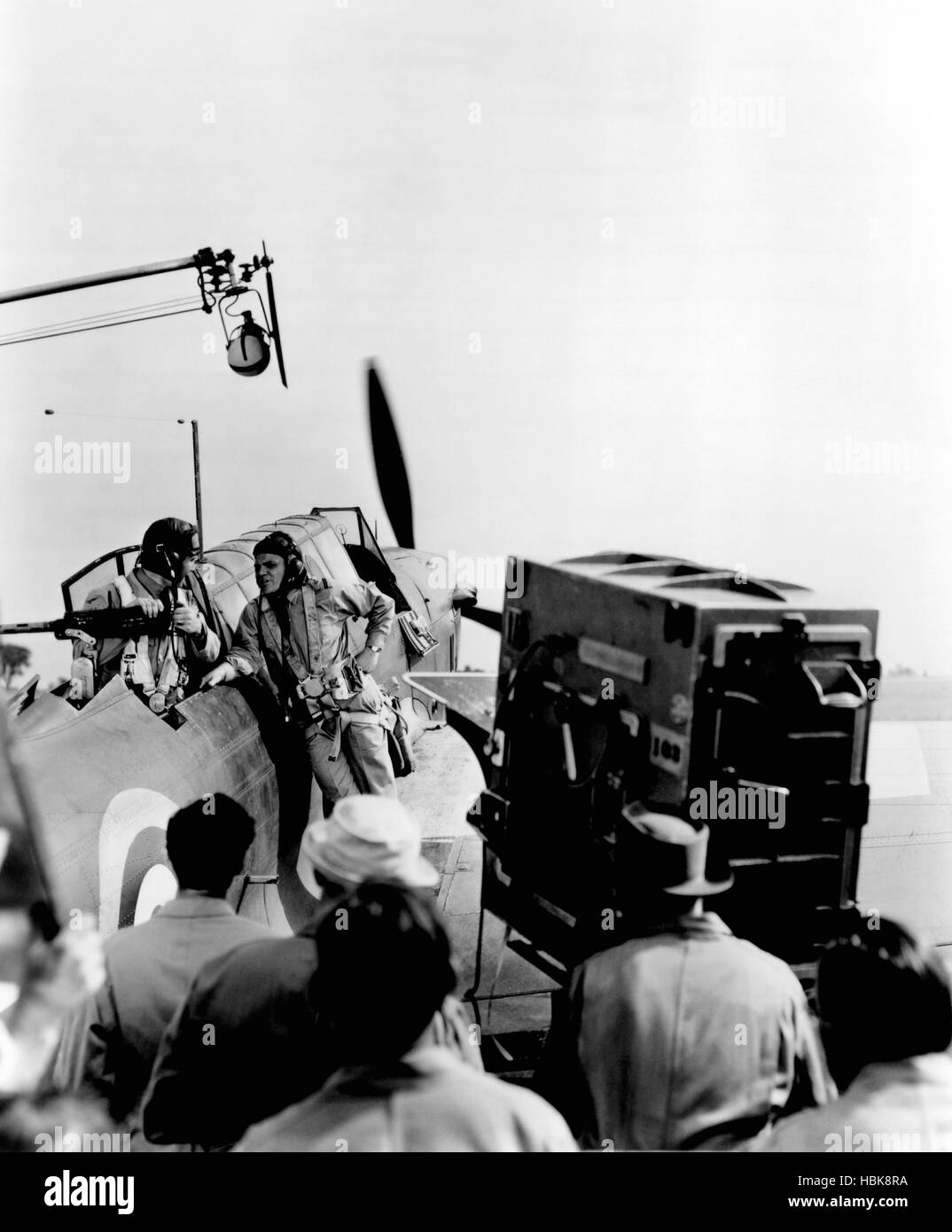 CAPTAINS OF THE CLOUDS, James Cagney (standing on airplane) filming a ...