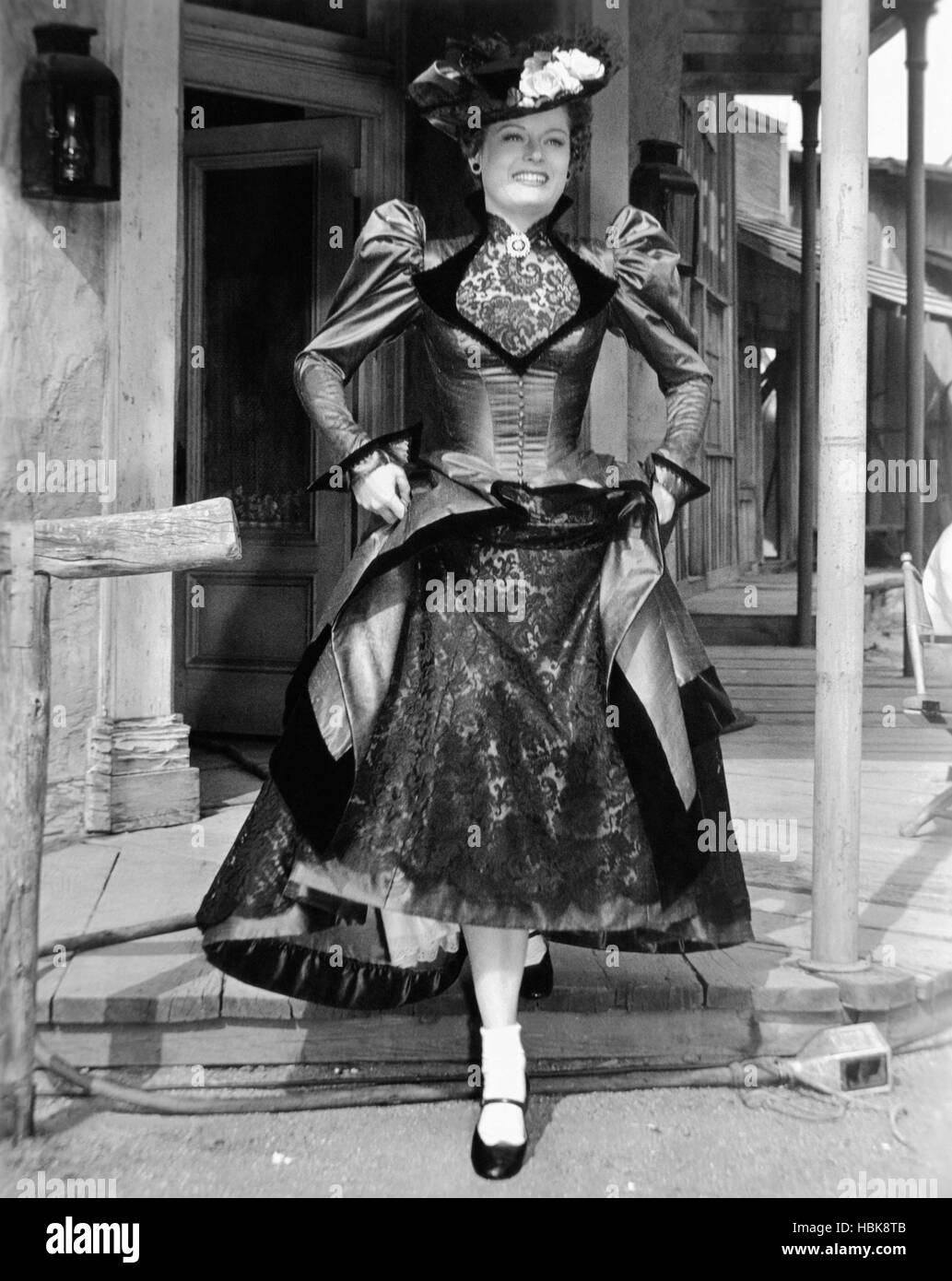 CAVE OF OUTLAWS, Alexis Smith, showing off her inaccurate footwear on ...