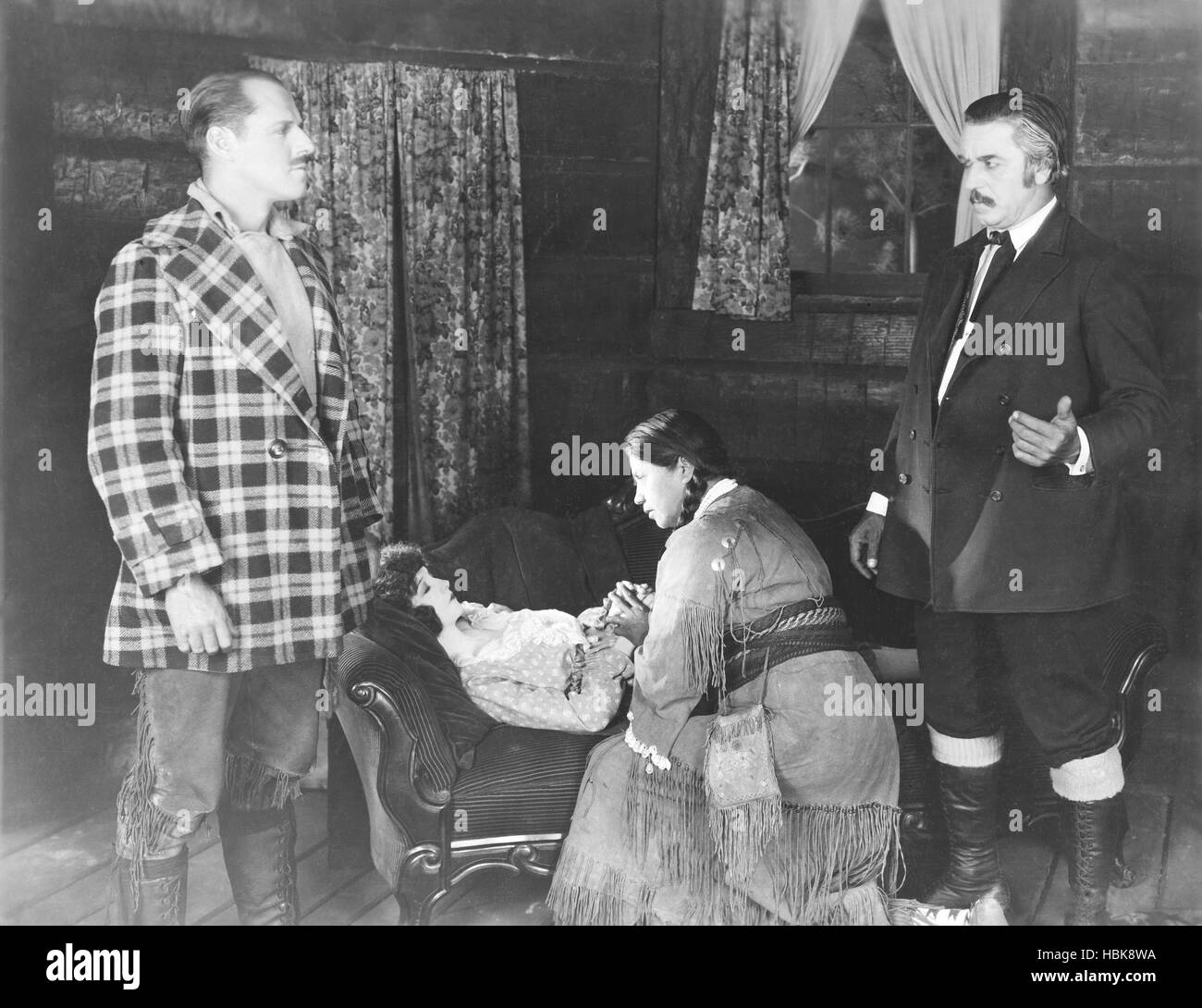 THE CALL OF THE NORTH, Jack Holt (far left), Madge Bellamy (on sofa ...
