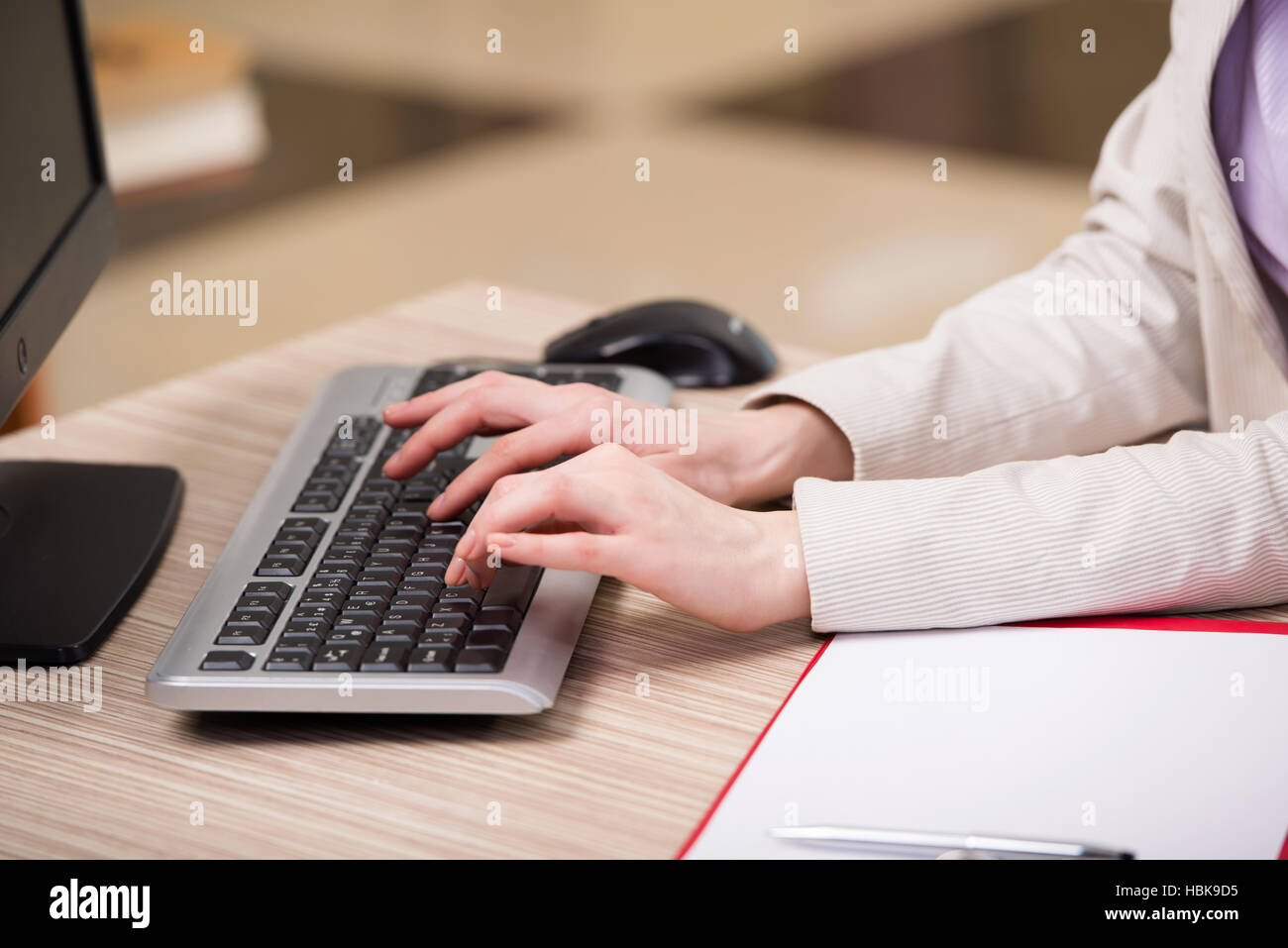 Hands working on the keyboard in the office Stock Photo - Alamy
