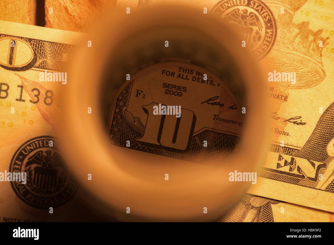 dollar bills tied with rubber band Stock Photo - Alamy