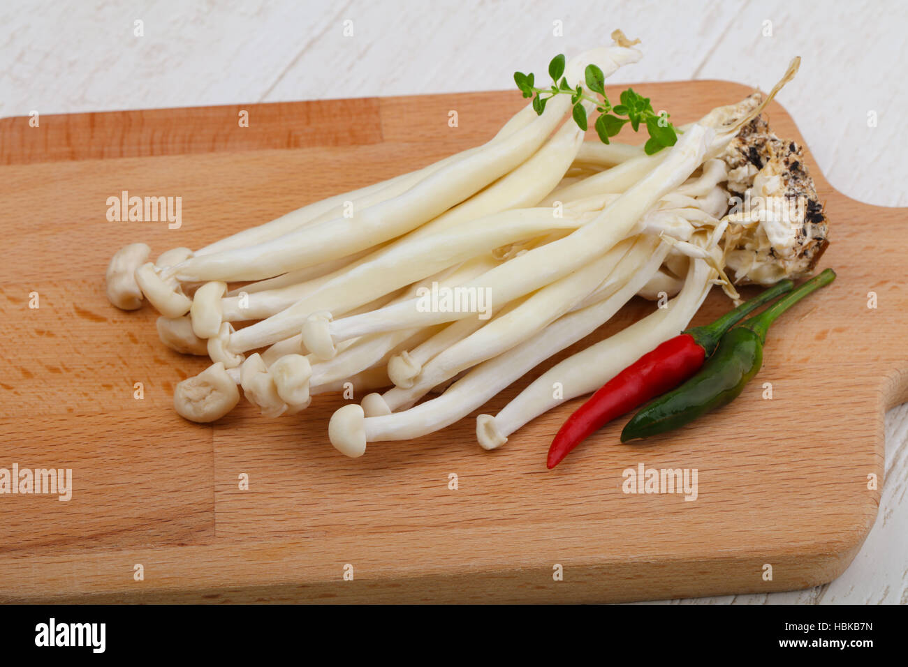Japanese mushroom - enoki raw food ready for cooking Stock Photo - Alamy