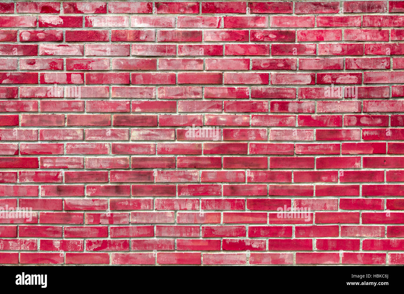 Bright colorful pink/red brick wall Stock Photo - Alamy
