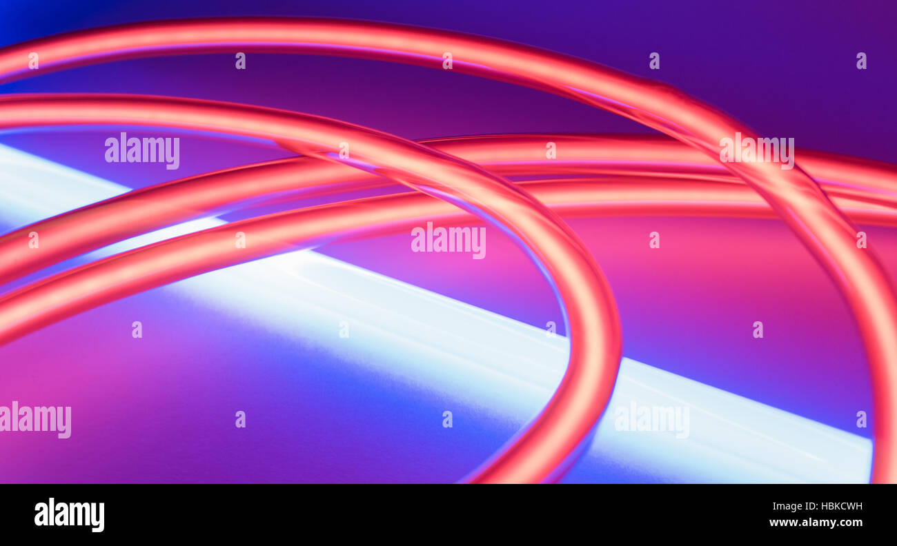 Art neon lighting light. Red neons background Stock Photo - Alamy