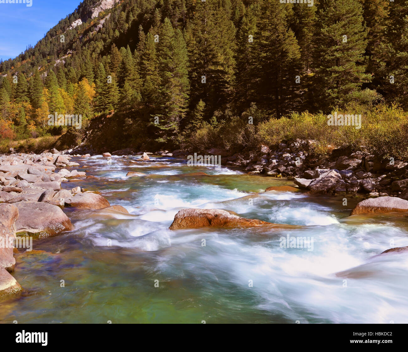 Mountain stream with boulder hi-res stock photography and images - Alamy