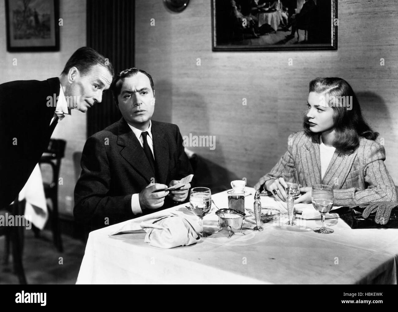 CONFIDENTIAL AGENT, from left: Gerald Hamer, Charles Boyer, Lauren ...
