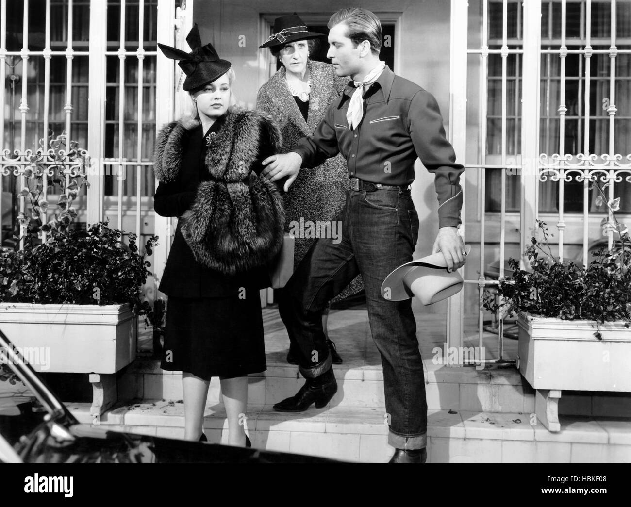 THE COWBOY AND THE BLONDE, from left, Mary Beth Hughes, Minerva Urecal ...