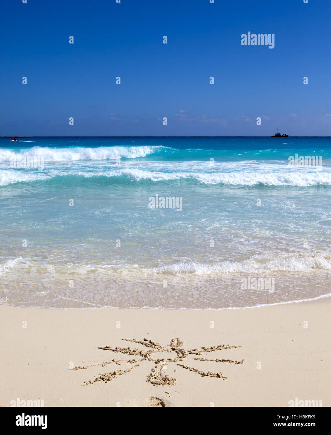 The sun - a picture on sand Stock Photo - Alamy