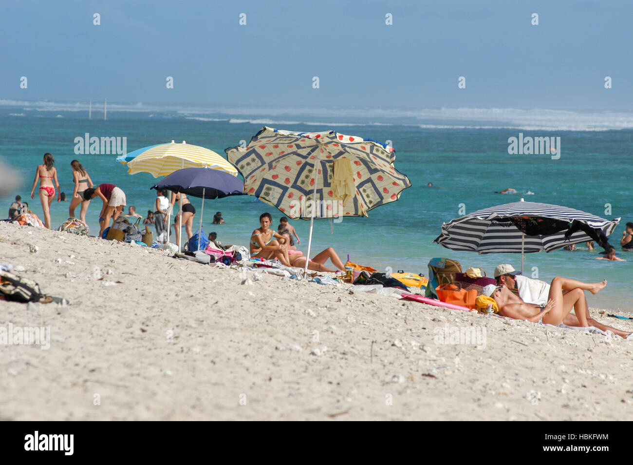 Hermitage (La Reunion), France - 11 March 2003: people sunbathing and ...