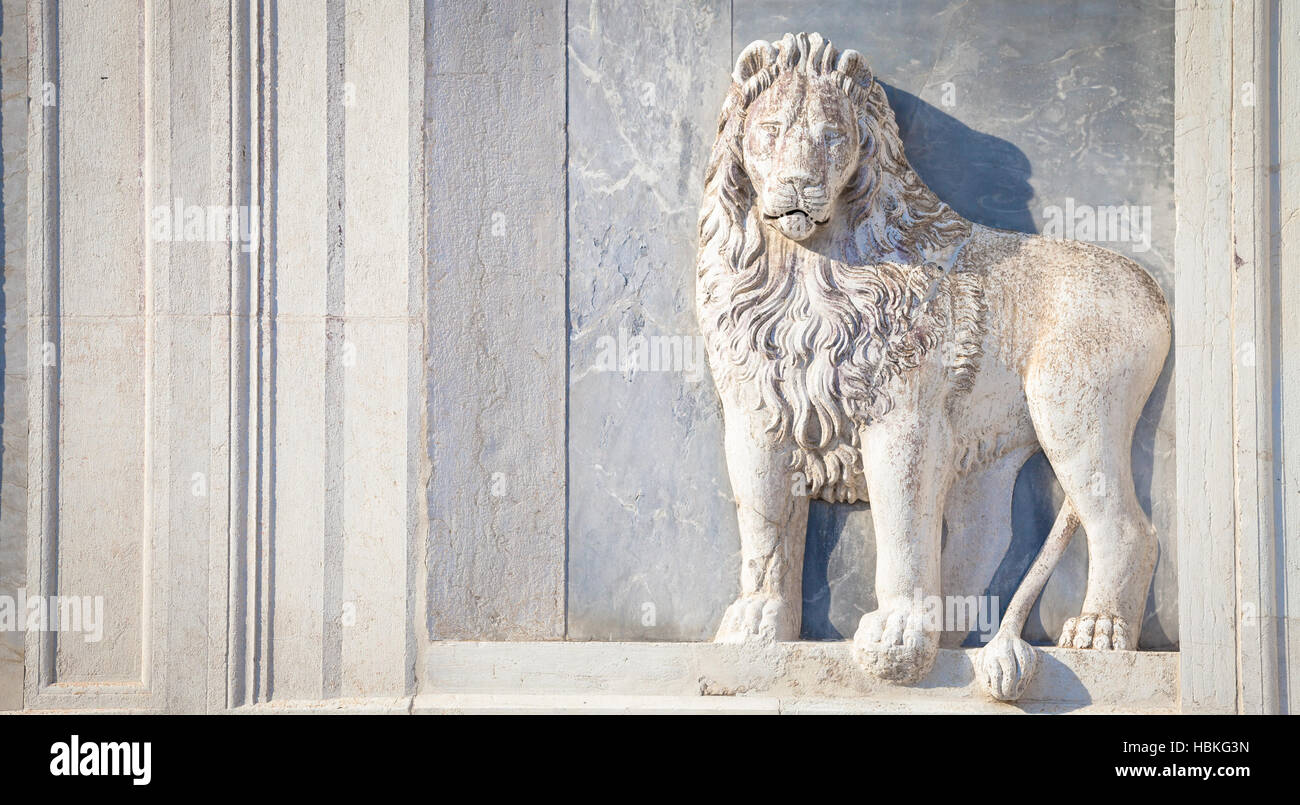 Marble lion on church facade Stock Photo - Alamy