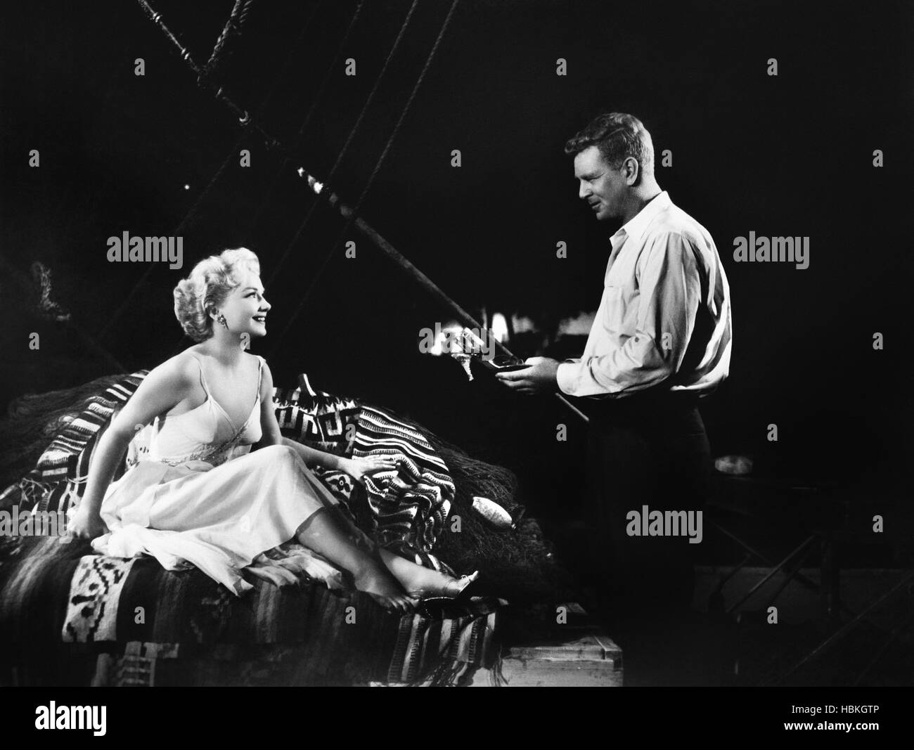 THE COME ON, from left: Anne Baxter, Sterling Hayden, 1956 Stock Photo ...