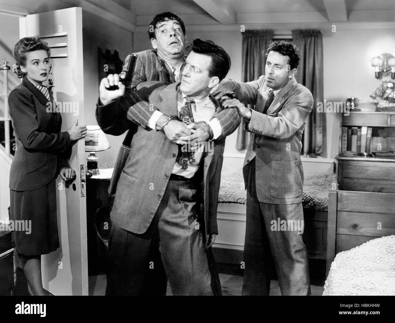 THE COUNTERFEITERS, from left, Doris Merrick, Lon Chaney, Jr., Hugh ...