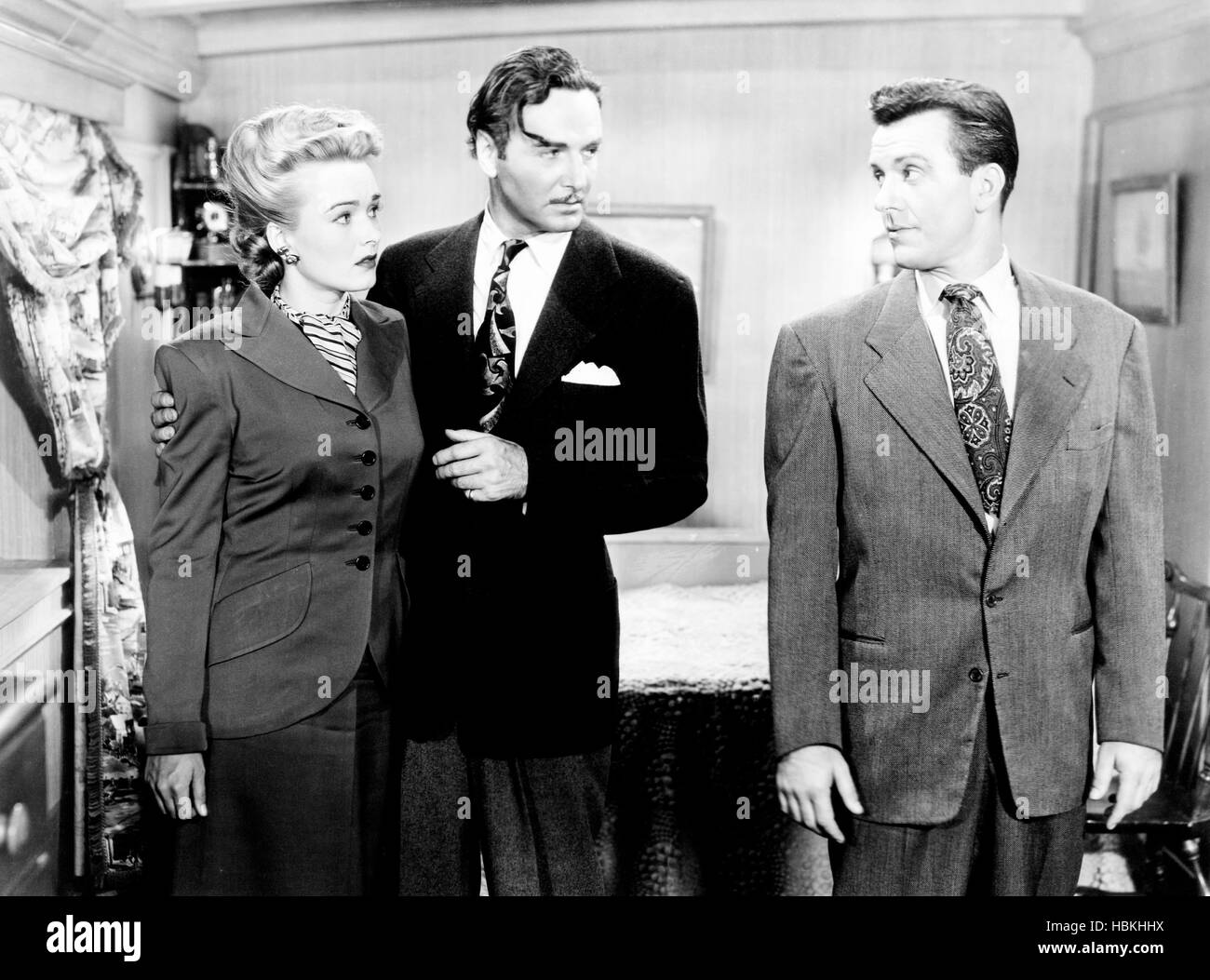 THE COUNTERFEITERS, from left: Doris Merrick, John Sutton, Hugh ...