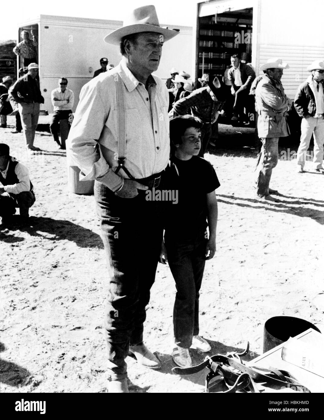THE COWBOYS, John Wayne, on-set with his son Ethan Wayne, 1972 Stock ...