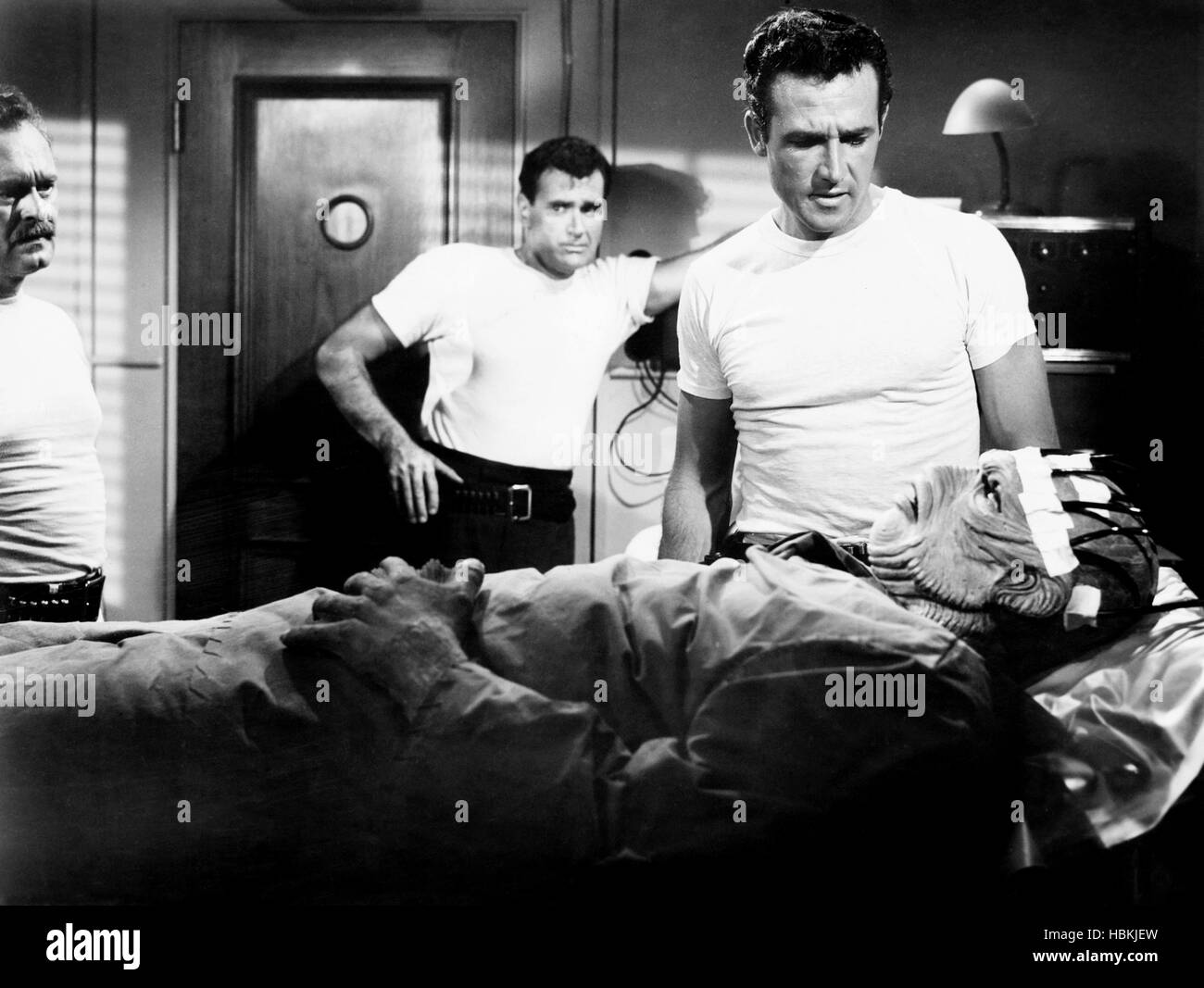 THE CREATURE WALKS AMONG US, from left, James Hawley, Jeff Morrow, Rex Reason, Don Megowan ...