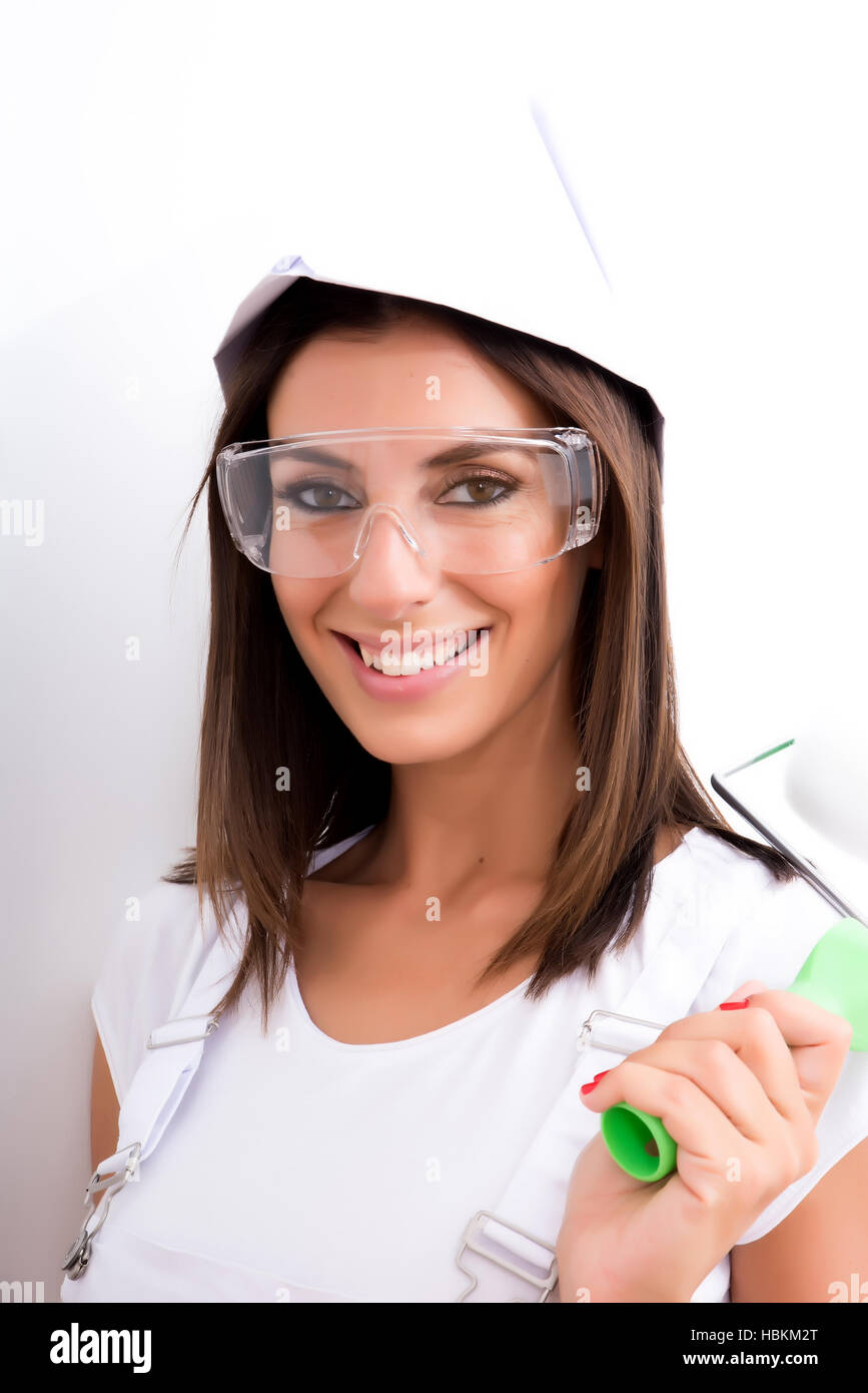 Beautiful young woman getting ready to paint Stock Photo - Alamy