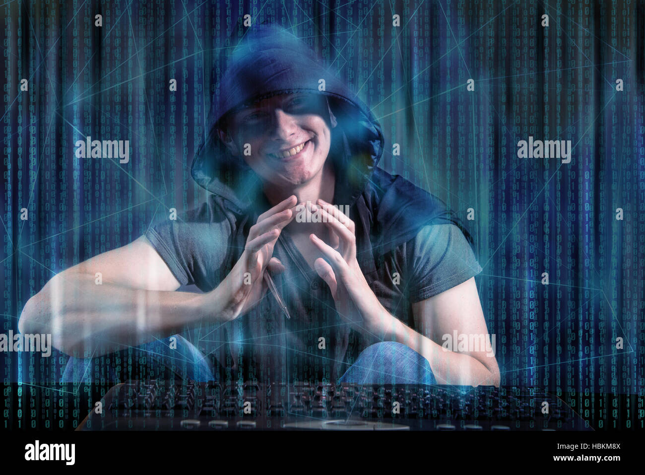 Young hacker in digital security concept Stock Photo - Alamy