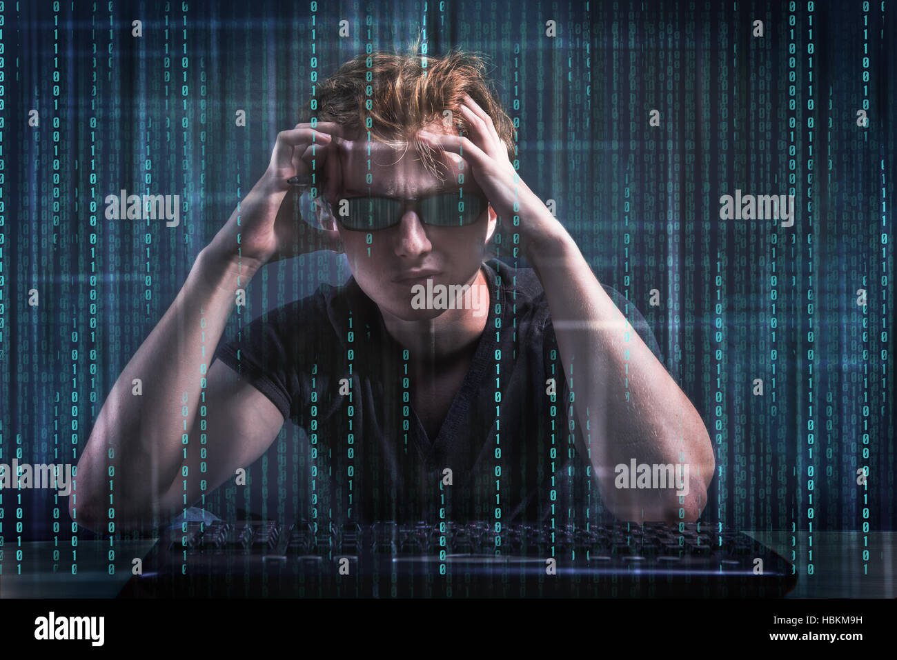 Young hacker in digital security concept Stock Photo - Alamy